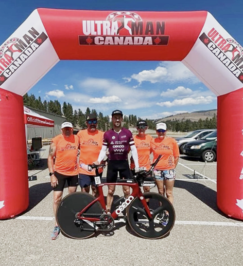 Record-breaking athlete Simon Cochrane powers to success assisted by C ...